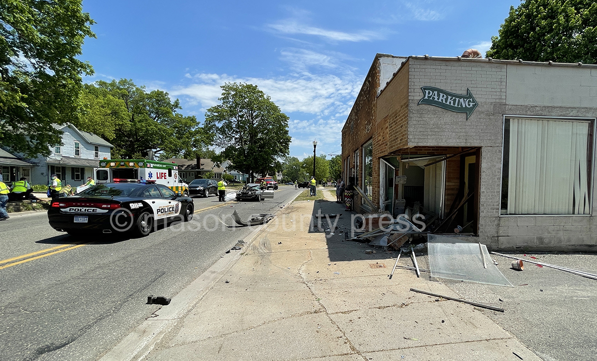 Vehicle strikes building in downtown Scottville. | MasonCountyPress.com