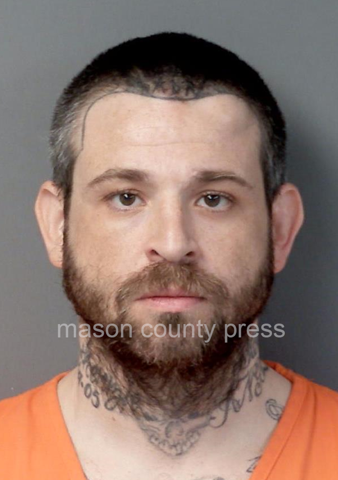 Parolee accused of armed robbery charged with 10 felonies ...